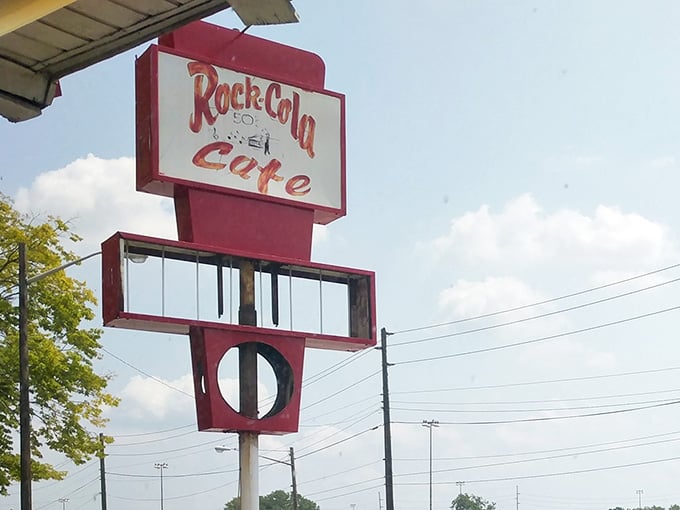 That retro sign stands tall like a beacon guiding hungry travelers to breakfast bliss below.