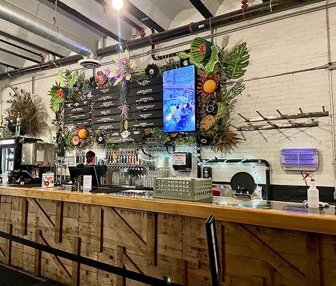 The bar where tropical florals meet craft beer taps, because why choose between garden party and brewery vibes?