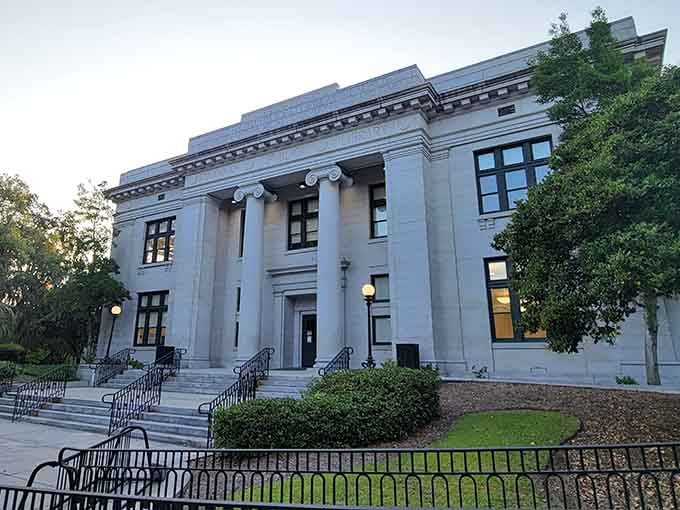Classical columns frame this public library where knowledge meets Southern architectural elegance in perfect harmony.