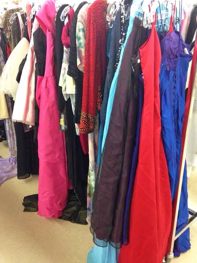 Sequined gowns and elegant dresses hang like memories of proms, galas, and celebrations from decades past.