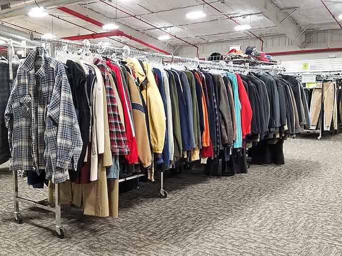 Men's clothing organized by color creates a rainbow effect that makes shopping actually enjoyable for once.
