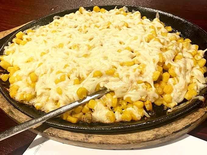 Corn cheese on a sizzling skillet: Korea's gift to anyone who ever thought cheese couldn't get any better.