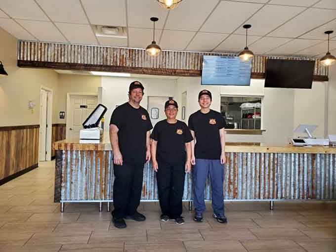 The friendly faces behind the magic, ready to serve up barbecue that'll make your day infinitely better.