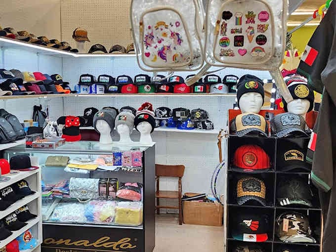 Hats and caps displayed by the dozens, because everyone needs options when expressing personality through headwear choices.