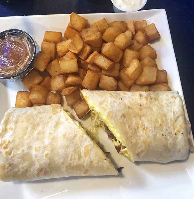 This breakfast burrito stuffed with eggs and potatoes is wrapped tight and ready to fuel your entire day.