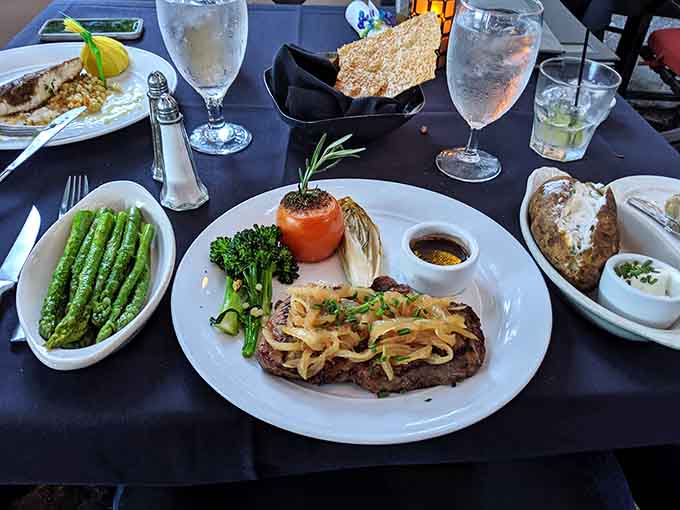 Tables set with crisp linens signal that this meal will be something worth remembering tomorrow.