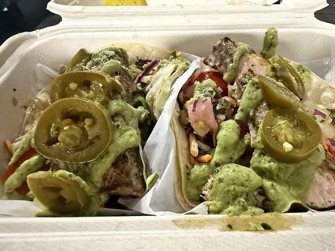 Fresh salmon tacos loaded with all the fixings, because California knows how to do fish right every time.