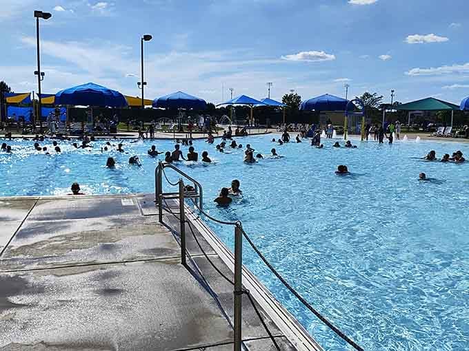 Crowds gather in the main pool, proving Minnesotans know exactly how to celebrate those precious warm-weather months together.