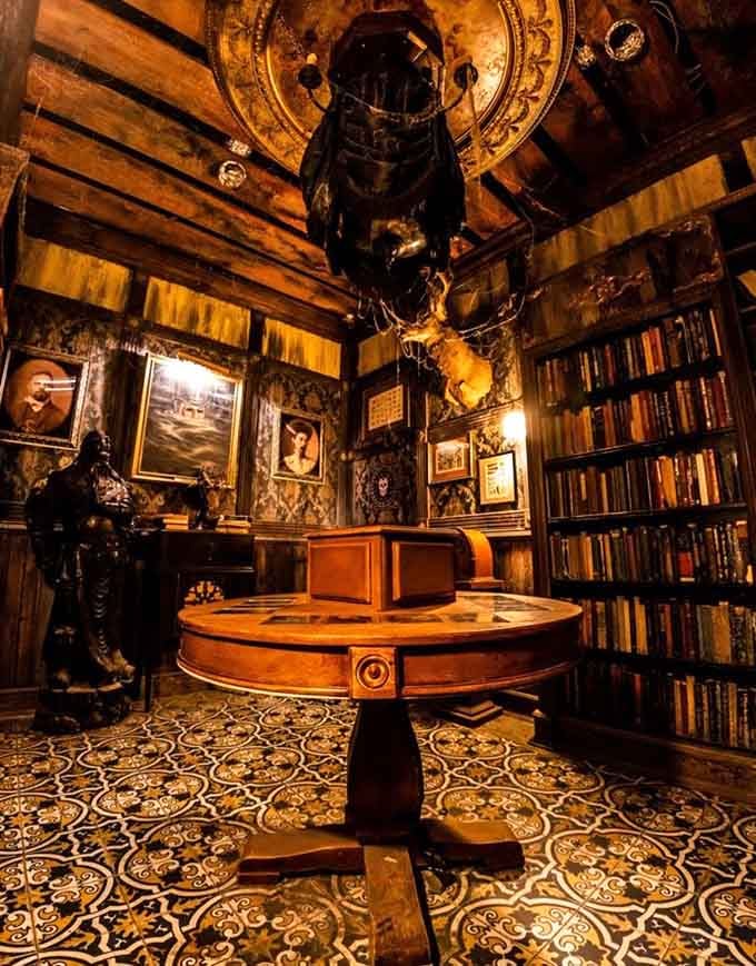 This richly appointed study looks like Sherlock Holmes decorated it after winning the lottery and developing excellent taste.