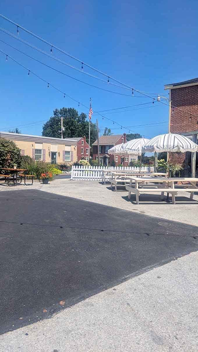 Outdoor seating where the biggest decision is which picnic table gets the best people-watching angle.