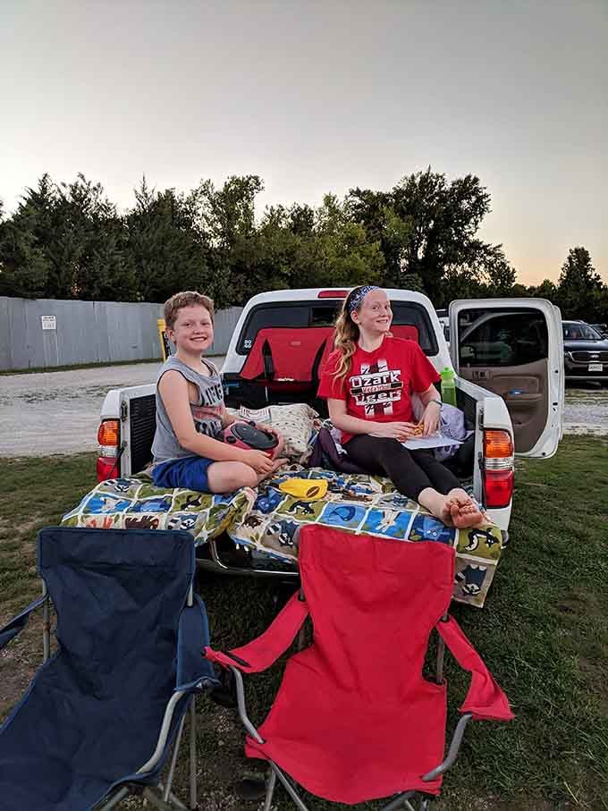 Truck bed seating with blankets and pillows, this is outdoor cinema luxury at its absolute finest.