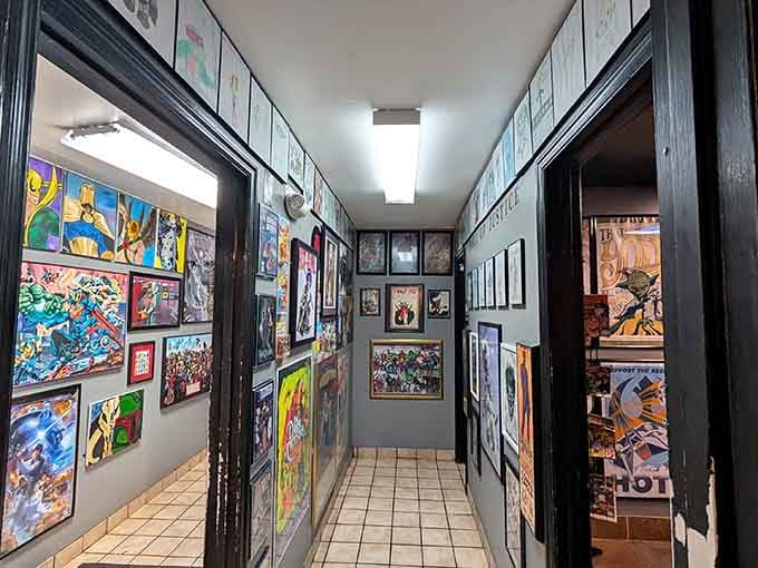 Floor-to-ceiling comic art transforms a simple hallway into a gallery celebrating decades of superhero storytelling excellence.