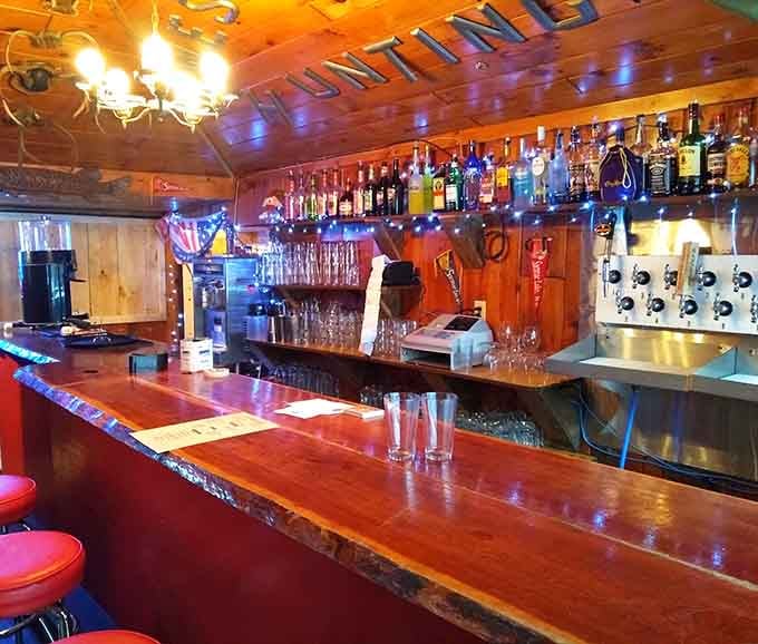The bar area glows with warmth and possibility, ready to pour your favorite beverage after adventure.