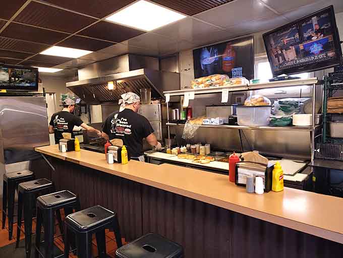 Behind the counter, the kitchen hums with practiced efficiency where steaming cabinets work their magic on every order that comes through.