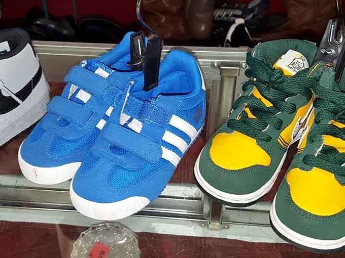 Little sneakers in team colors mean your kids can stomp through puddles without stomping on your wallet.