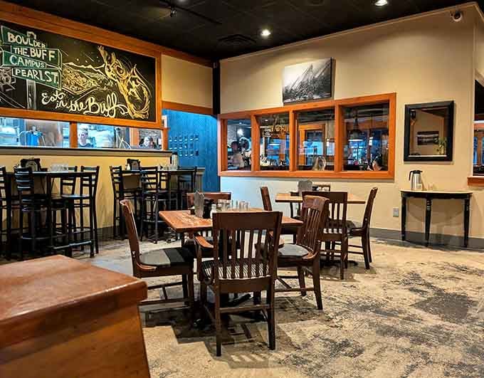 The chalkboard art and cozy seating arrangements give this space a neighborhood gathering spot vibe that feels just right.
