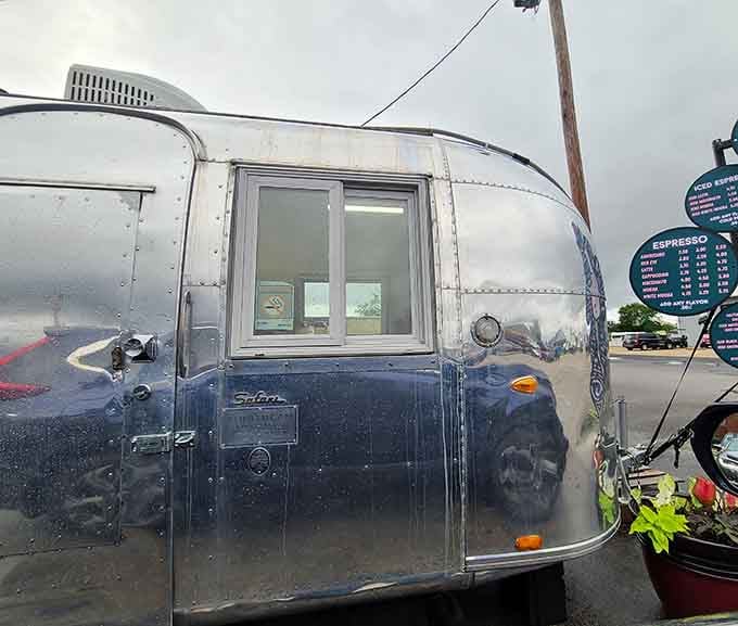 The order window of this Airstream is where caffeinated dreams come true, one perfectly pulled espresso shot at a time.