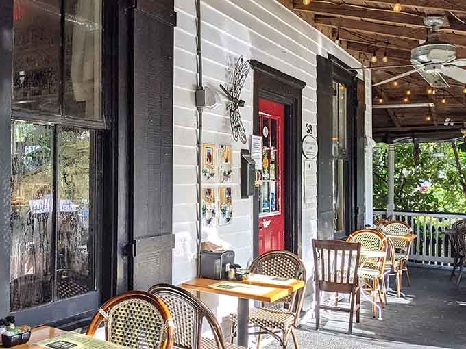 Bistro chairs on the covered porch offer the perfect perch for people-watching while your food coma gently sets in.