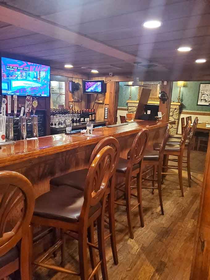 A well-stocked bar with TVs means you can catch the game while waiting for your steak.