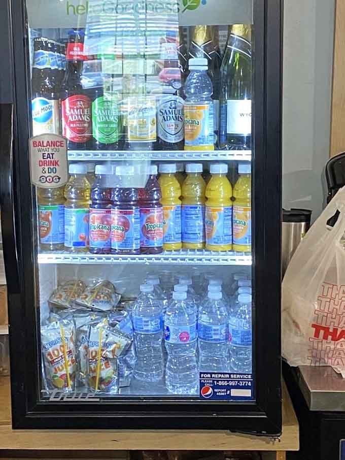 The beverage cooler stocks everything from craft beers to fruit drinks, covering all your refreshment needs throughout the day.