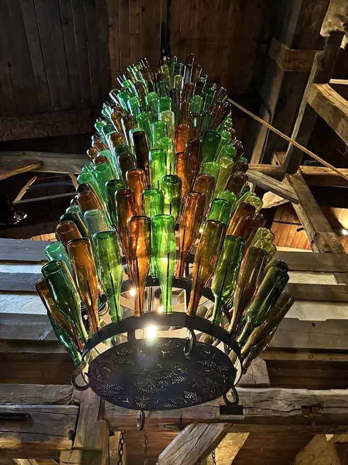 A chandelier made entirely of bottles&mdash;because why waste perfectly good glass when it can become art?