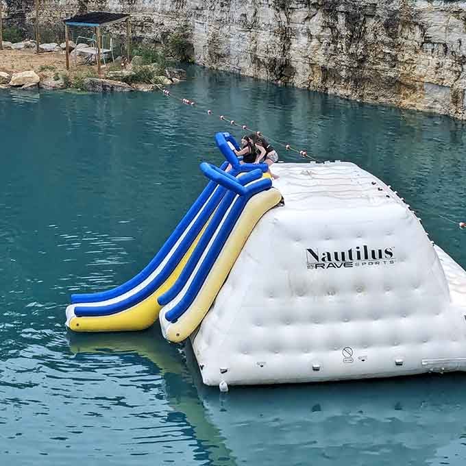 Inflatable water slides add extra thrills to an already incredible natural setting, doubling the fun factor.
