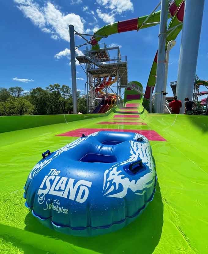 The Island slide awaits at the top of those colorful towers, ready to deliver maximum summer thrills.