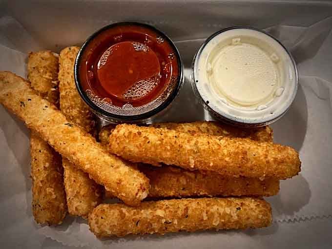 Crispy mozzarella sticks with marinara and ranch prove some appetizers never go out of style for very good reasons.