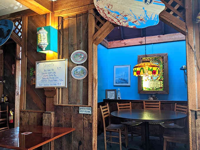 Vibrant blue walls and eclectic artwork prove this place doesn't take itself too seriously, just the food.