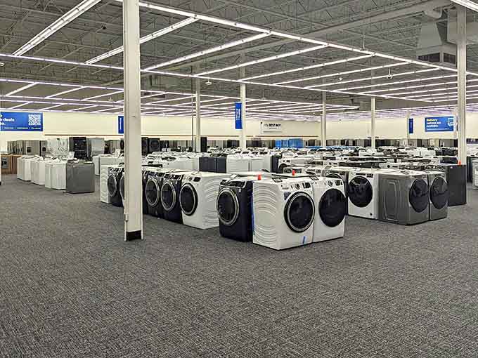 Rows of washers and dryers stand ready like appliance soldiers, making home upgrades surprisingly affordable here.