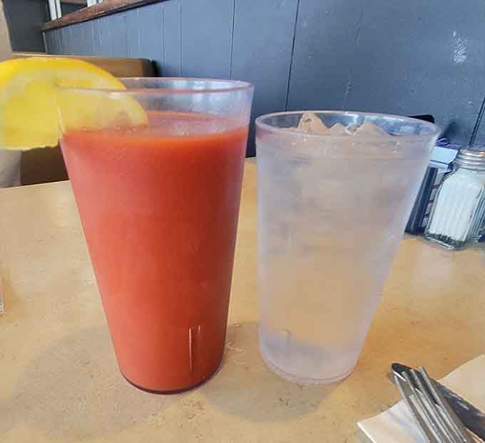 Fresh juice and lemonade looking refreshingly innocent next to all that glorious breakfast excess happening around them.