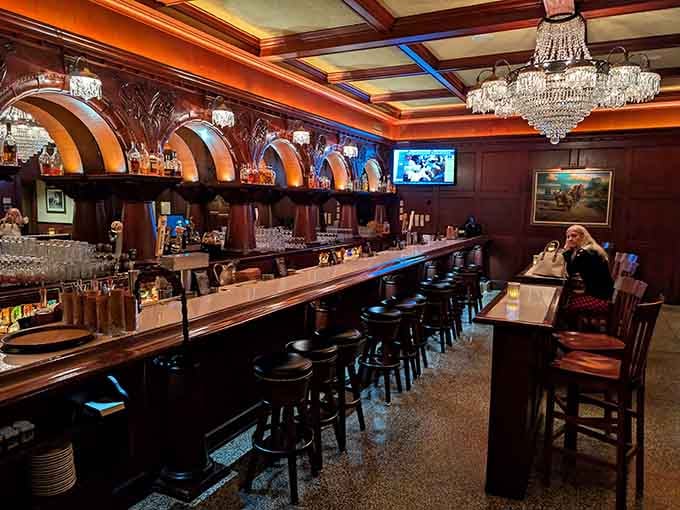 That gleaming mahogany bar and sparkling chandeliers create the perfect spot for a pre-dinner cocktail or nightcap.