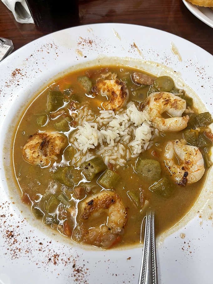 Seafood gumbo loaded with shrimp and okra over rice brings Louisiana flavor straight to the South Carolina coast beautifully.