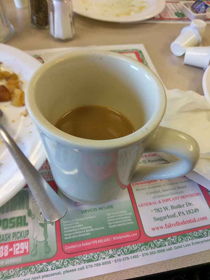 Hot coffee in a classic mug tastes better when you know refills keep coming without even asking for them.