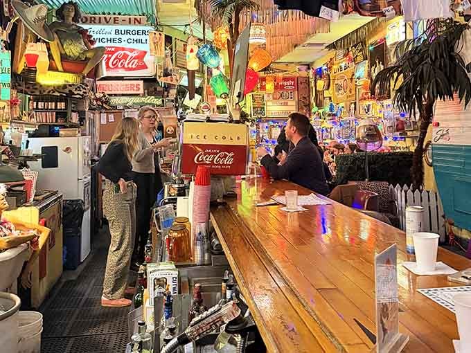 The bar where neon dreams come true and nobody judges your third order of tater tots.