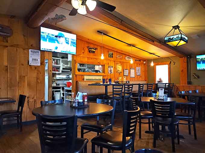 Cozy tavern atmosphere with wood paneling that feels authentically Michigan, not manufactured nostalgia from a catalog.