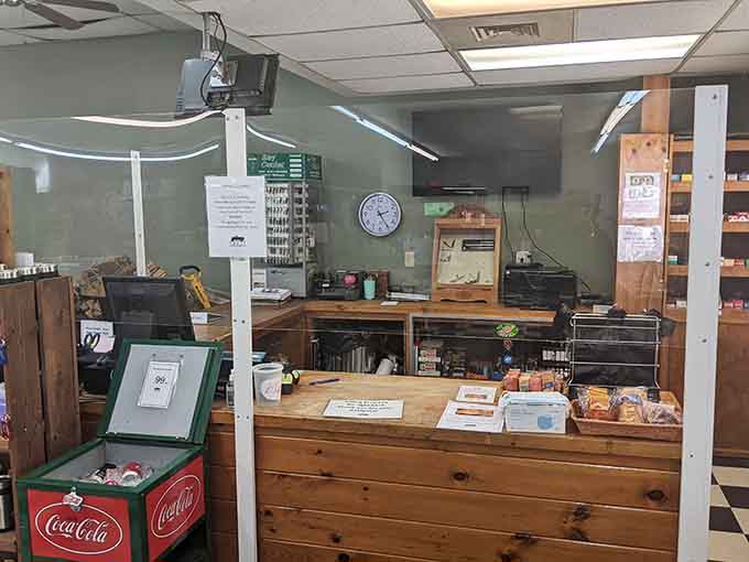 The wooden checkout counter exudes that old-timey general store vibe while somehow managing to look completely contemporary and welcoming.