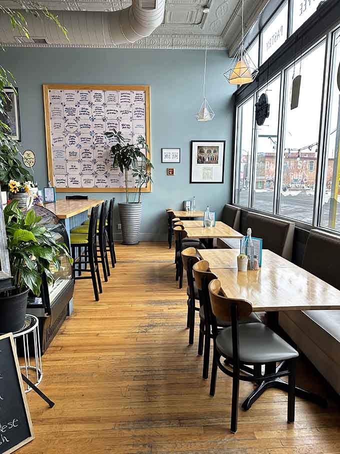 Window seats with natural light and art on the walls create the perfect spot for lingering.