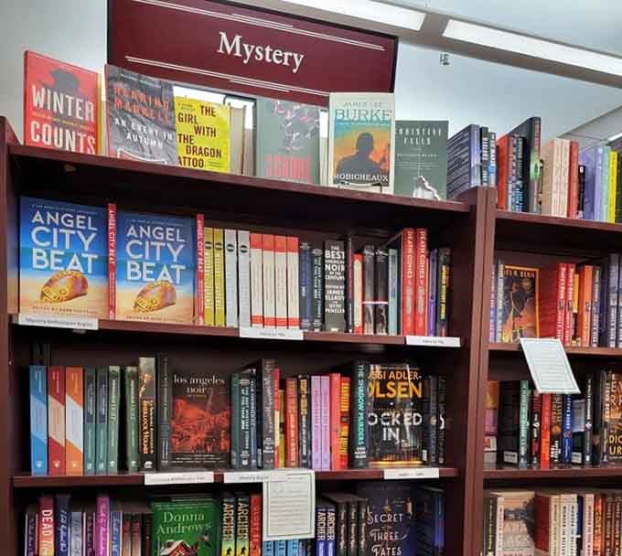 Mystery shelves stocked deep with whodunits, thrillers, and detective novels to keep you guessing until dawn.