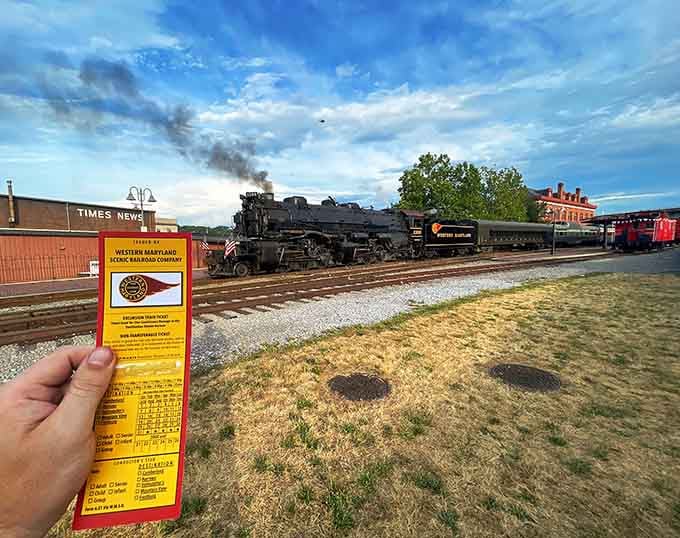 Your golden ticket to mountain views, held proudly before the steam engine that'll carry you through paradise.