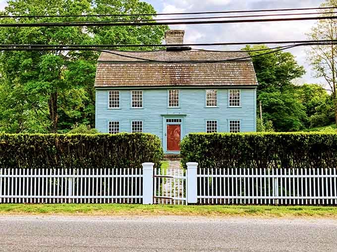 This powder-blue colonial gem stands as a testament to the architectural treasures that make Woodbury genuinely special.