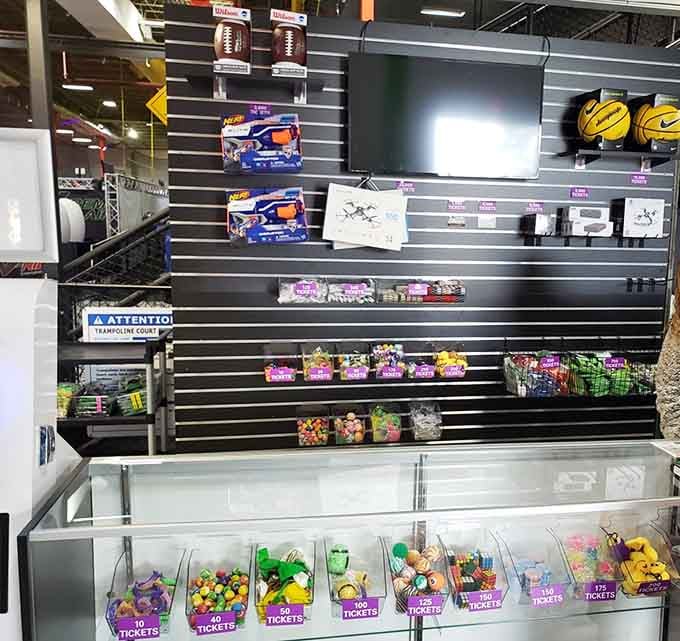 The redemption counter where tickets become treasures and kids learn the valuable lesson that winning stuff is awesome.