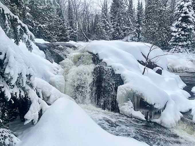 Winter turns the falls into a frozen sculpture garden, proving that Mother Nature moonlights as an ice artist.