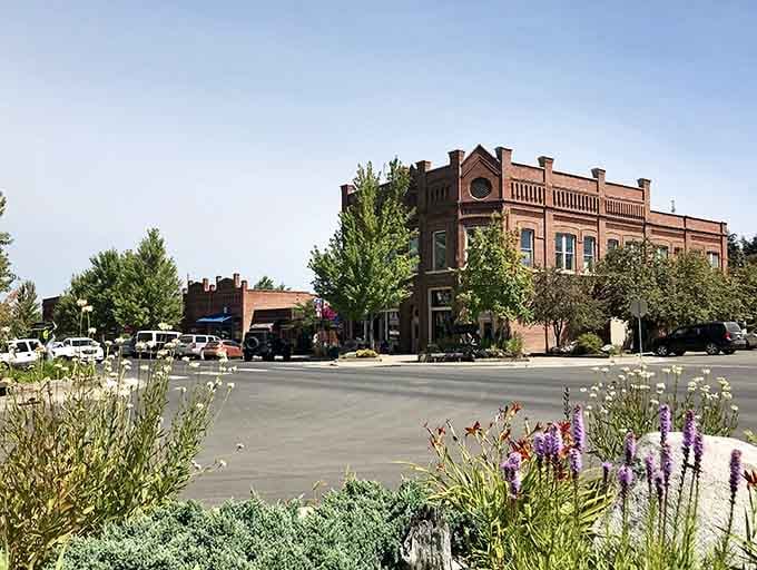 Wildflowers and historic brick create a picture-perfect scene where the Old West meets modern mountain town sophistication beautifully.