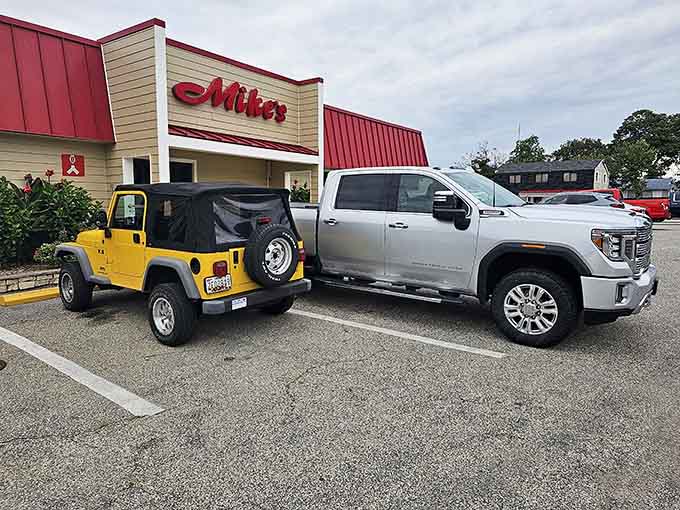 The classic red metal roof signals you've arrived at a place where crab traditions run deep.