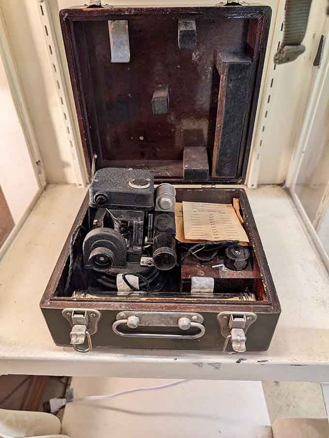 An antique sextant in its original case, because someone actually navigated by stars once.