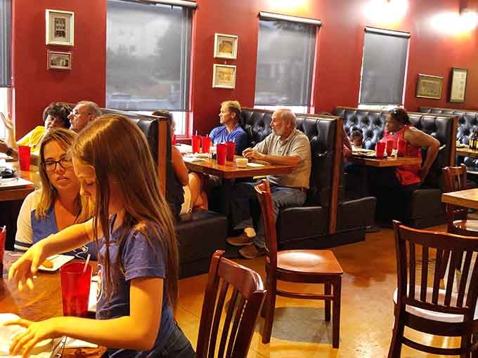 Comfortable booth seating and a relaxed atmosphere make lingering over pizza feel like the right choice.