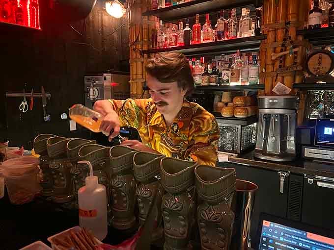 Your bartender mixing drinks with the focus of someone defusing a bomb, except way more fun to watch.