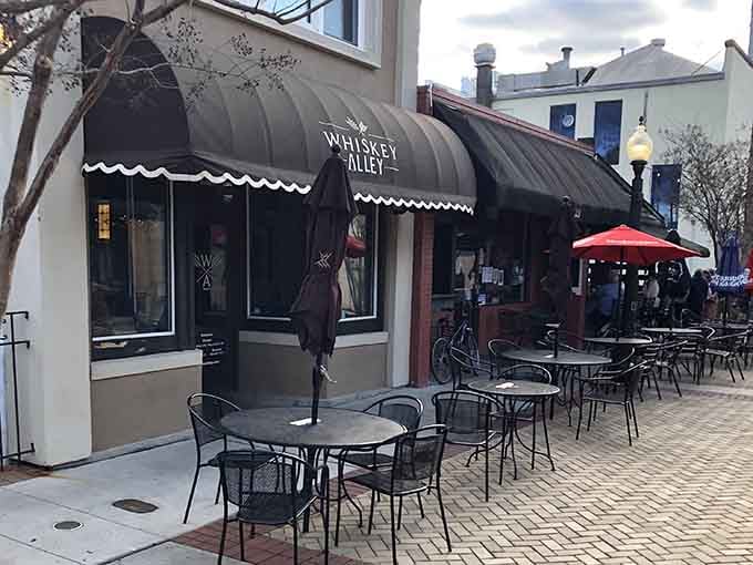 Whiskey Alley's outdoor seating invites you to linger over drinks and conversation without checking your watch every five minutes nervously.