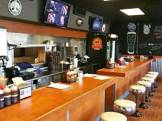 Counter seating with a view of the kitchen, because watching barbecue magic happen enhances the experience.